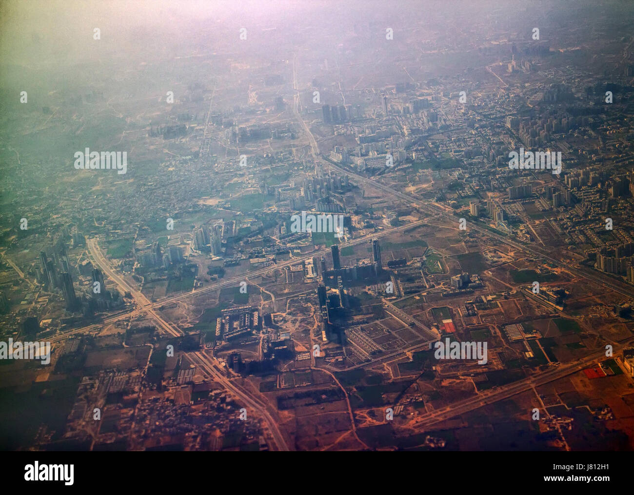 Journey by air. A view of city from plane. City Of India (North of ...