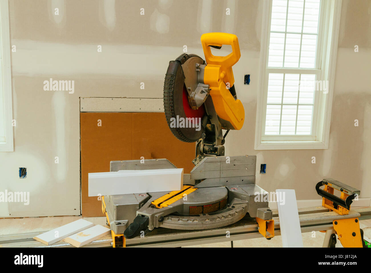 man cutting wood on electric saw Circular saw cutting wooden Stock ...