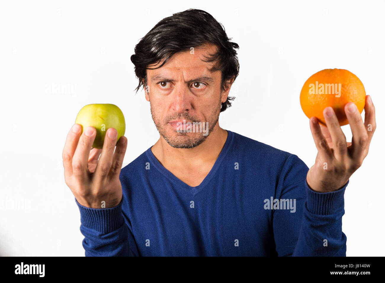 Comparing apples and oranges hi-res stock photography and images - Alamy