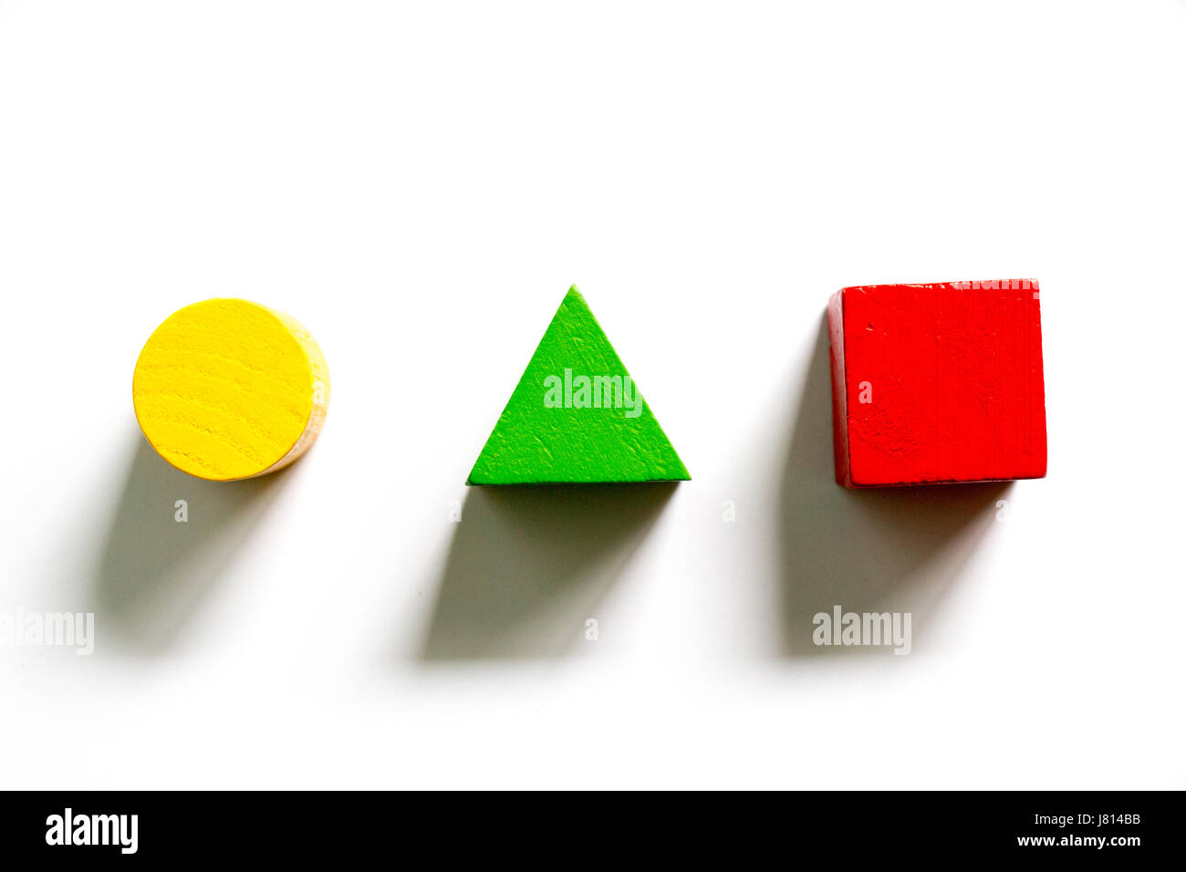 Set of colorful wooden shape toy (Square, triangle, round) on white ...