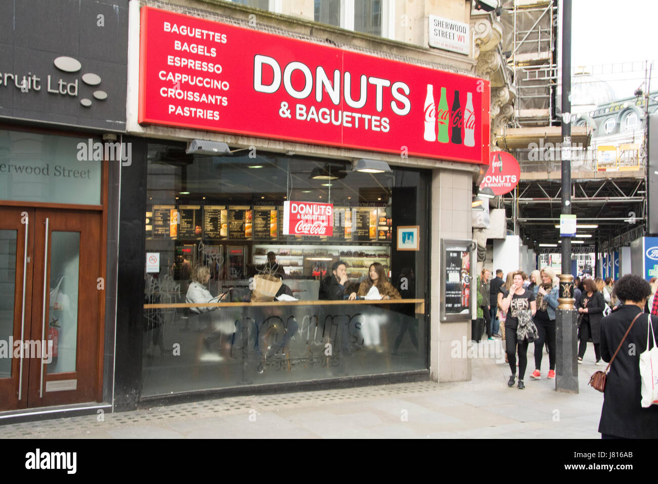 Donuts and Baguettes Cafe in central London, England, UK Stock Photo ...