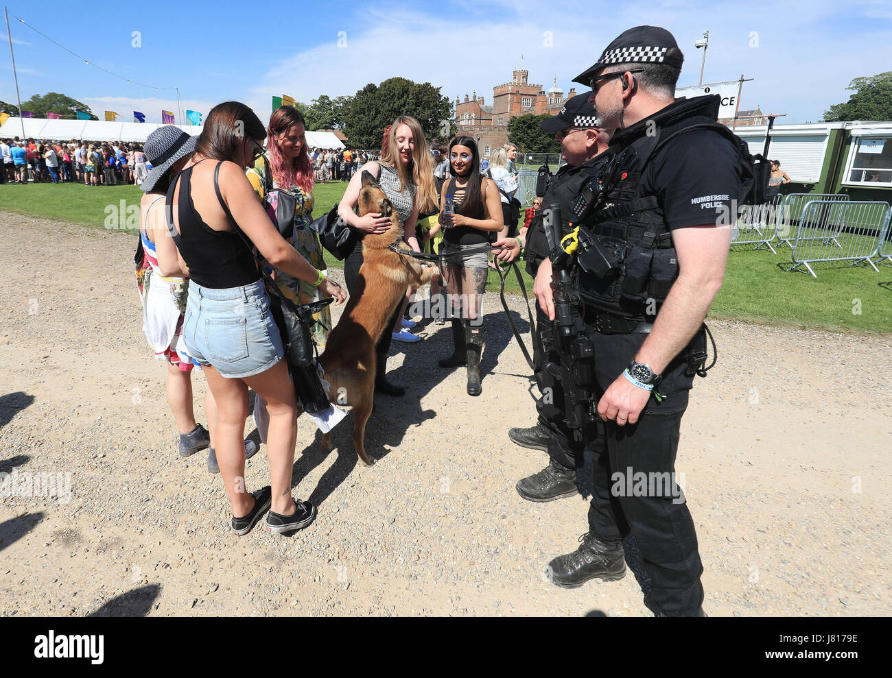Armed police officers patrol outside burton constable hall in hull hi ...