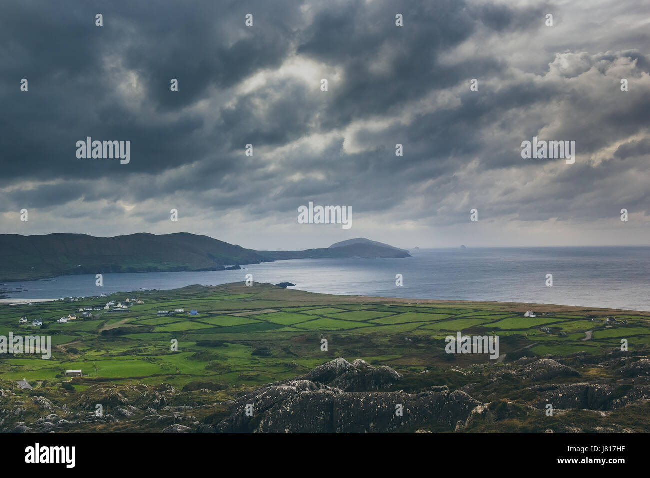 the Allihies village and the cliff fields with the Ballydonegan Bay ...