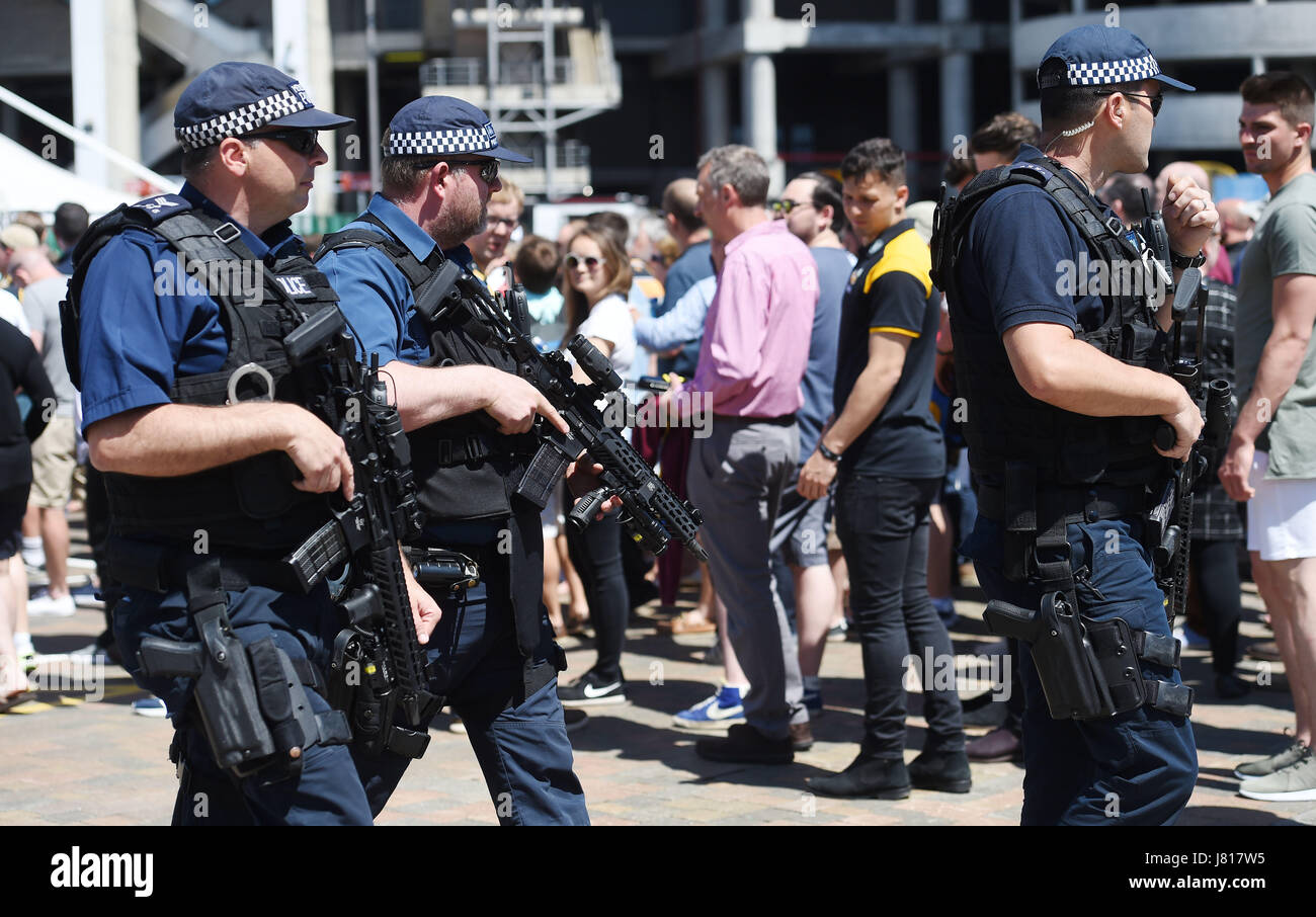 Armed police officers patrol outside the Aviva Premiership Rugby Final ...