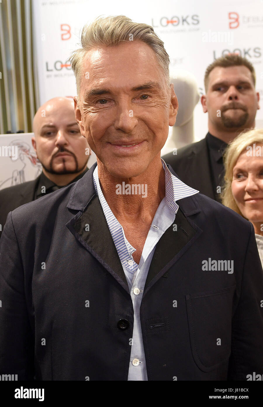 Fashion designer Wolfgang Joop stands in the crowd at the presentation ...