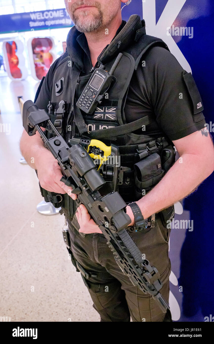 Armed Police patrol Leeds City Railway Station. West Yorkshire. UK. 26 ...