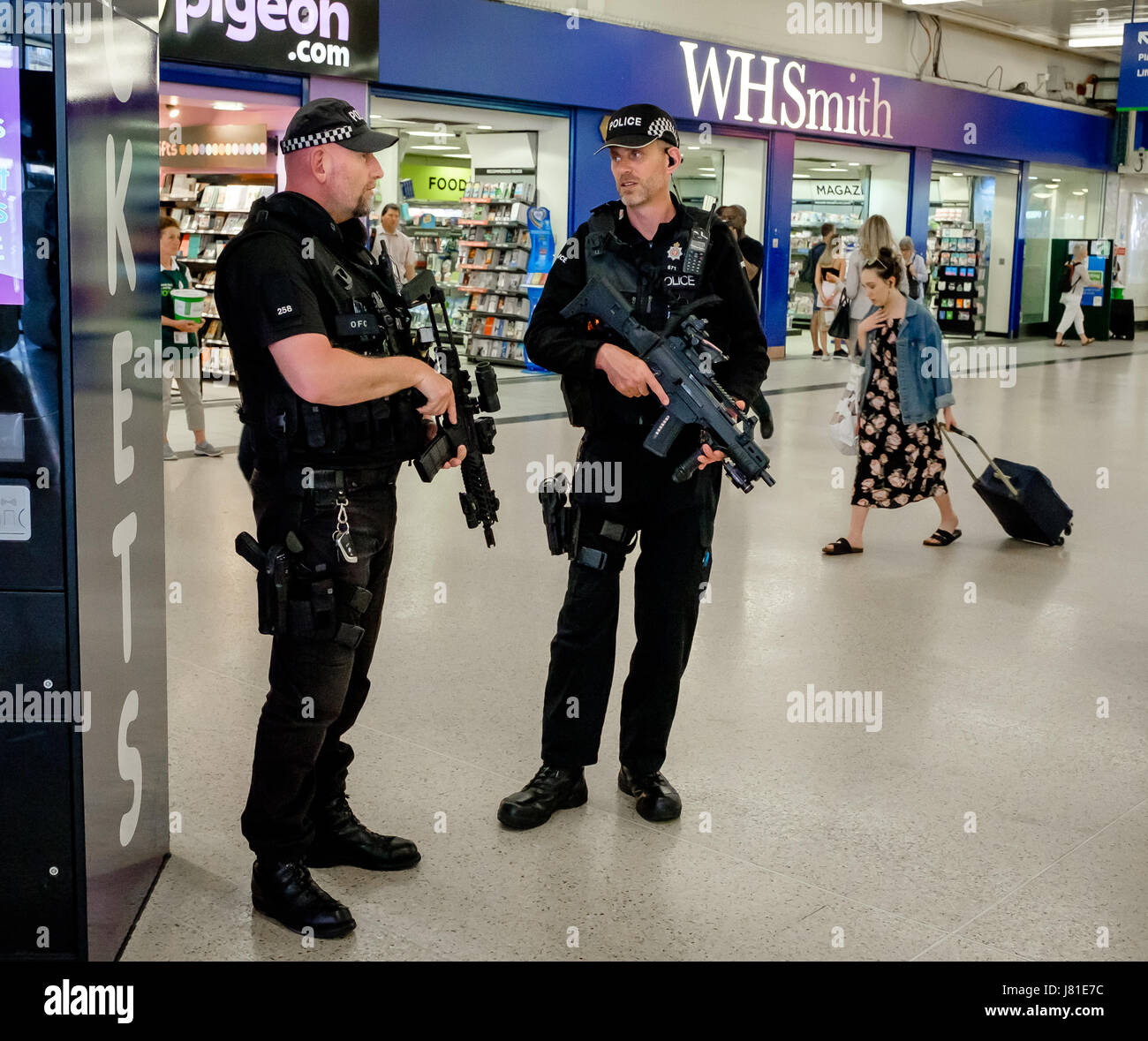 Armed Police patrol Leeds City Railway Station. West Yorkshire. UK. 26 ...