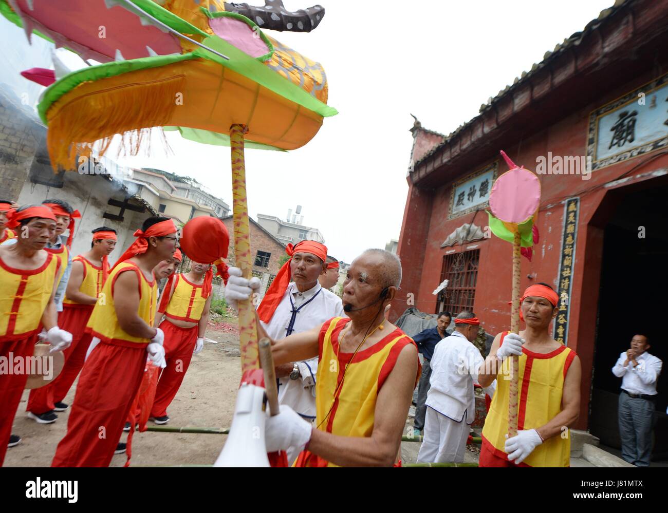 Pingxiang. 26th May, 2017. Villagers are ready to depart during a land ...