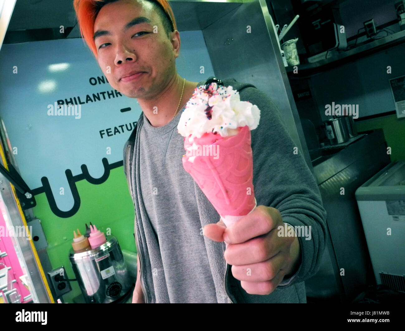 New York, US. 24th May, 2017. Ken Lo, employee of the ice cream parlor ...