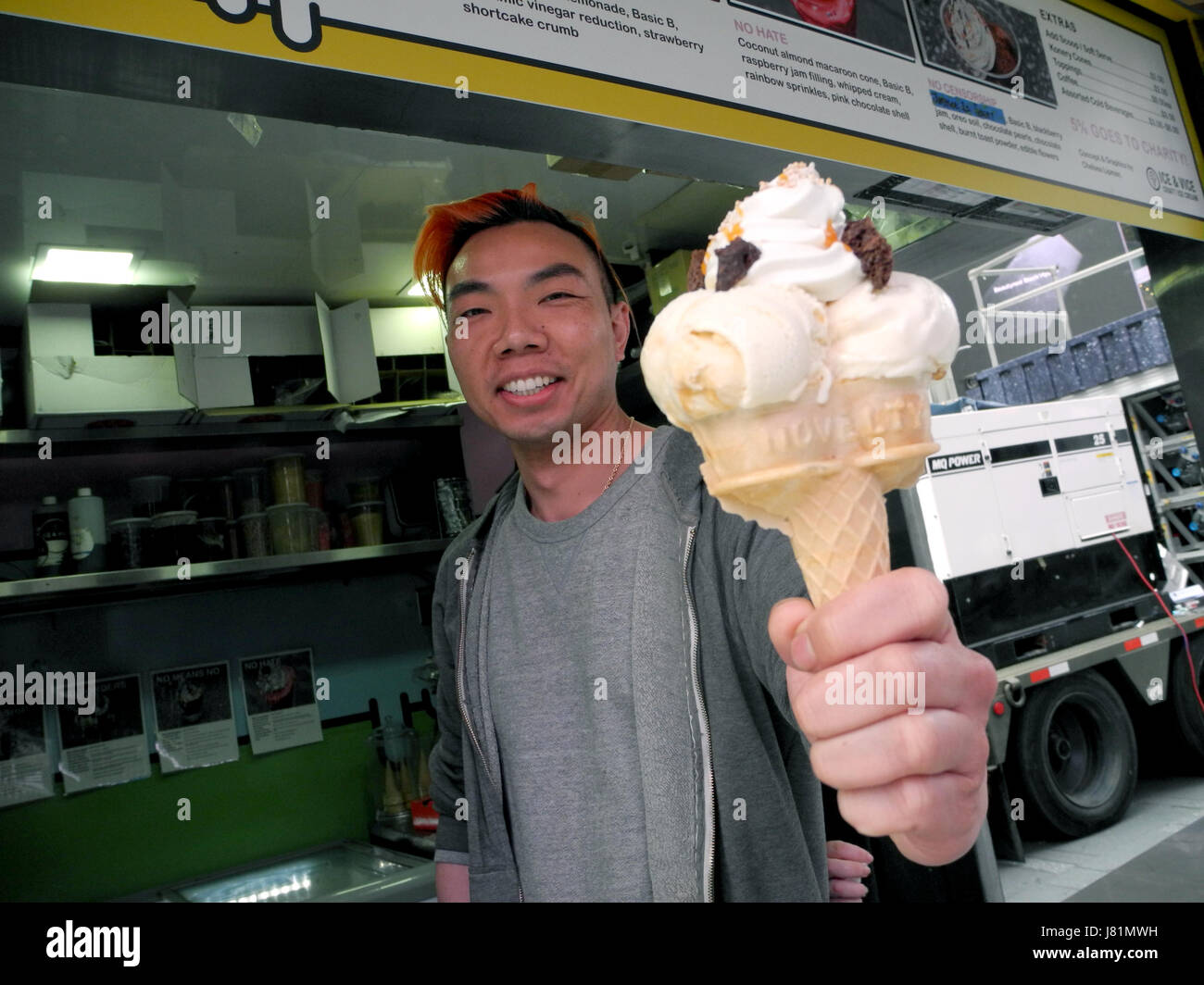 New York, US. 24th May, 2017. Ken Lo, employee of the ice cream parlor ...