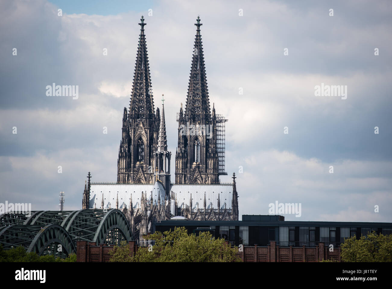 Cologne Cathedral and Deutz bridge in cloudy sky Stock Photo - Alamy