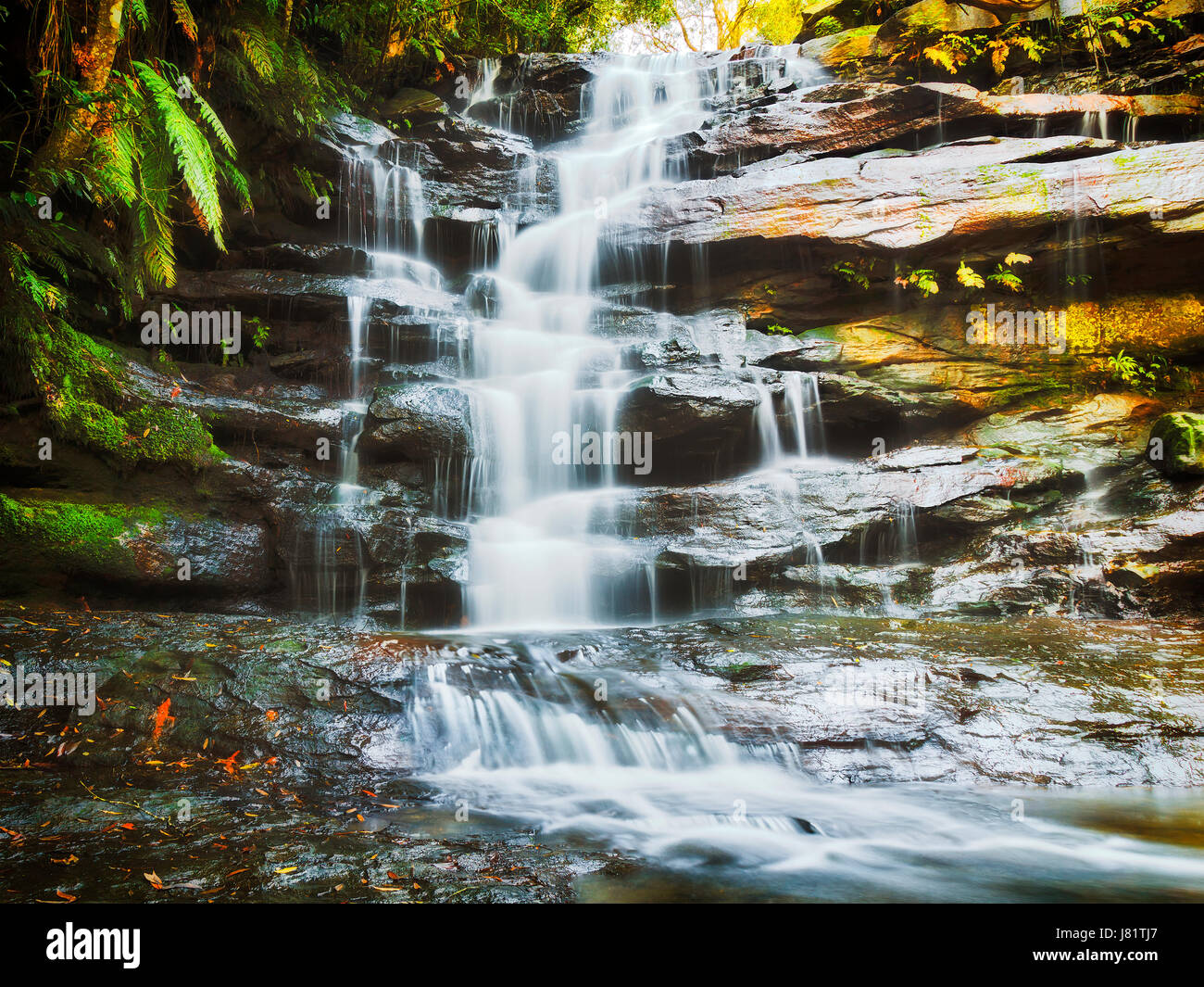 FLowing cold clean water stream of Somersby fall near Gosford on ...