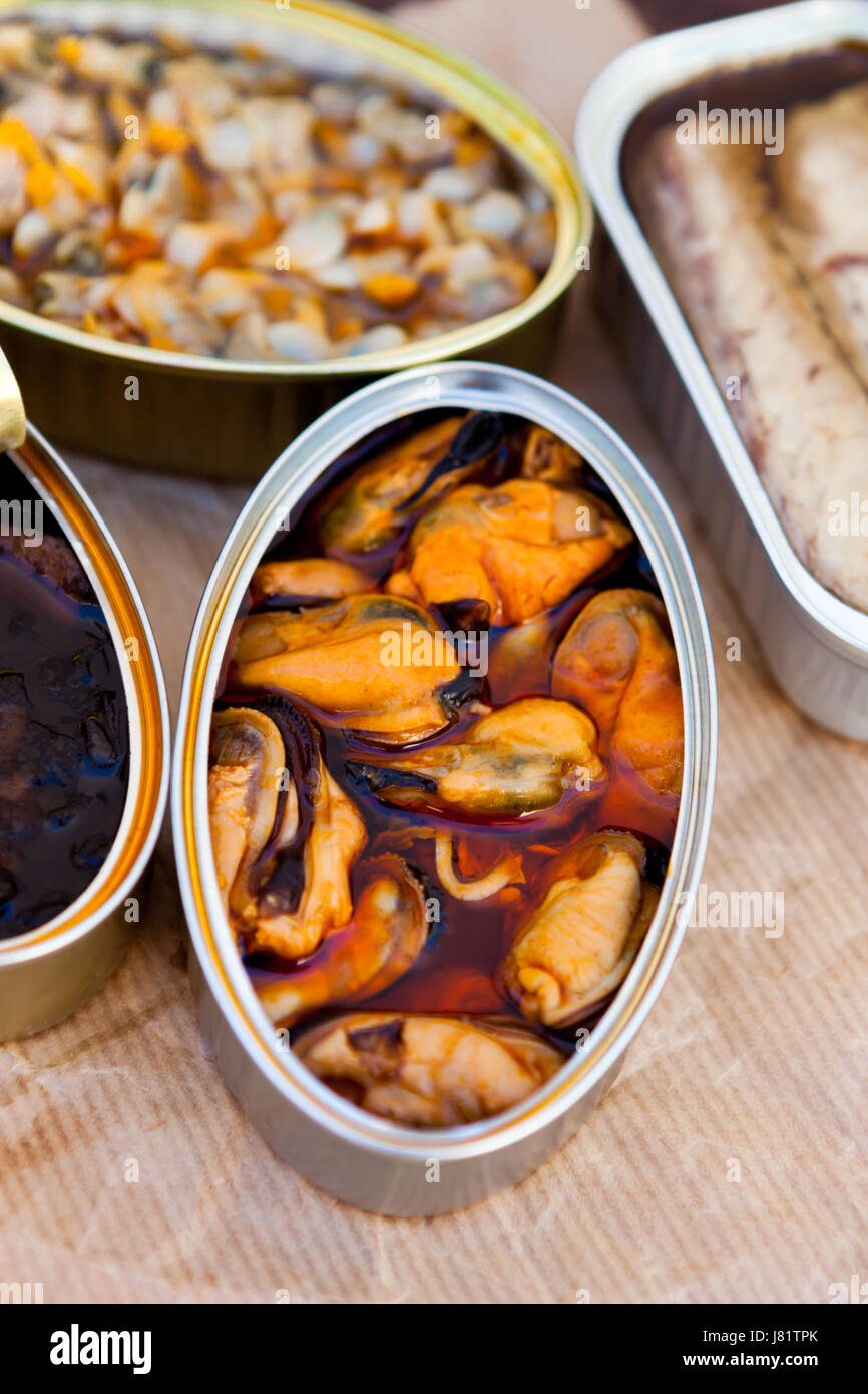 Canister of canned mussels. Healthy meal Stock Photo - Alamy
