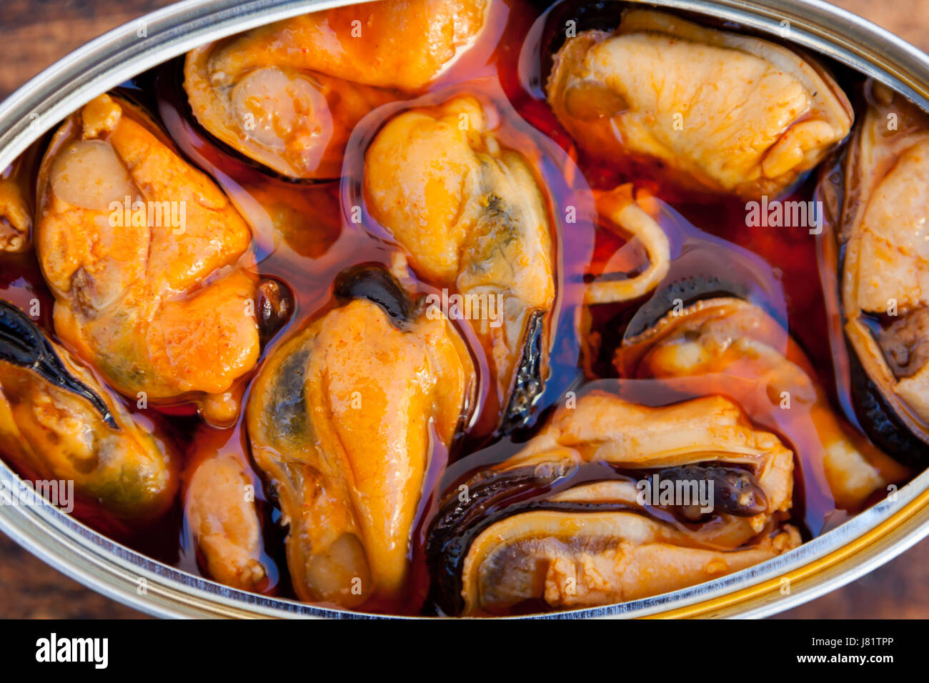 Canister of canned mussels. Healthy meal Stock Photo - Alamy