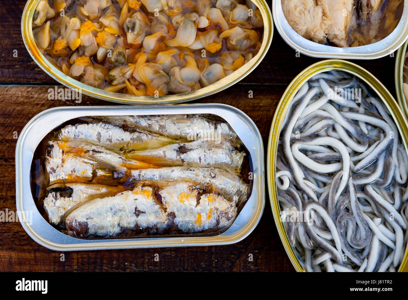 Assortment of open tin cans for a healthy dinner Stock Photo - Alamy
