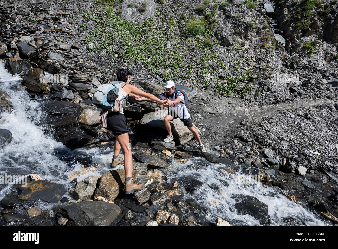 Helping environment hi-res stock photography and images - Alamy