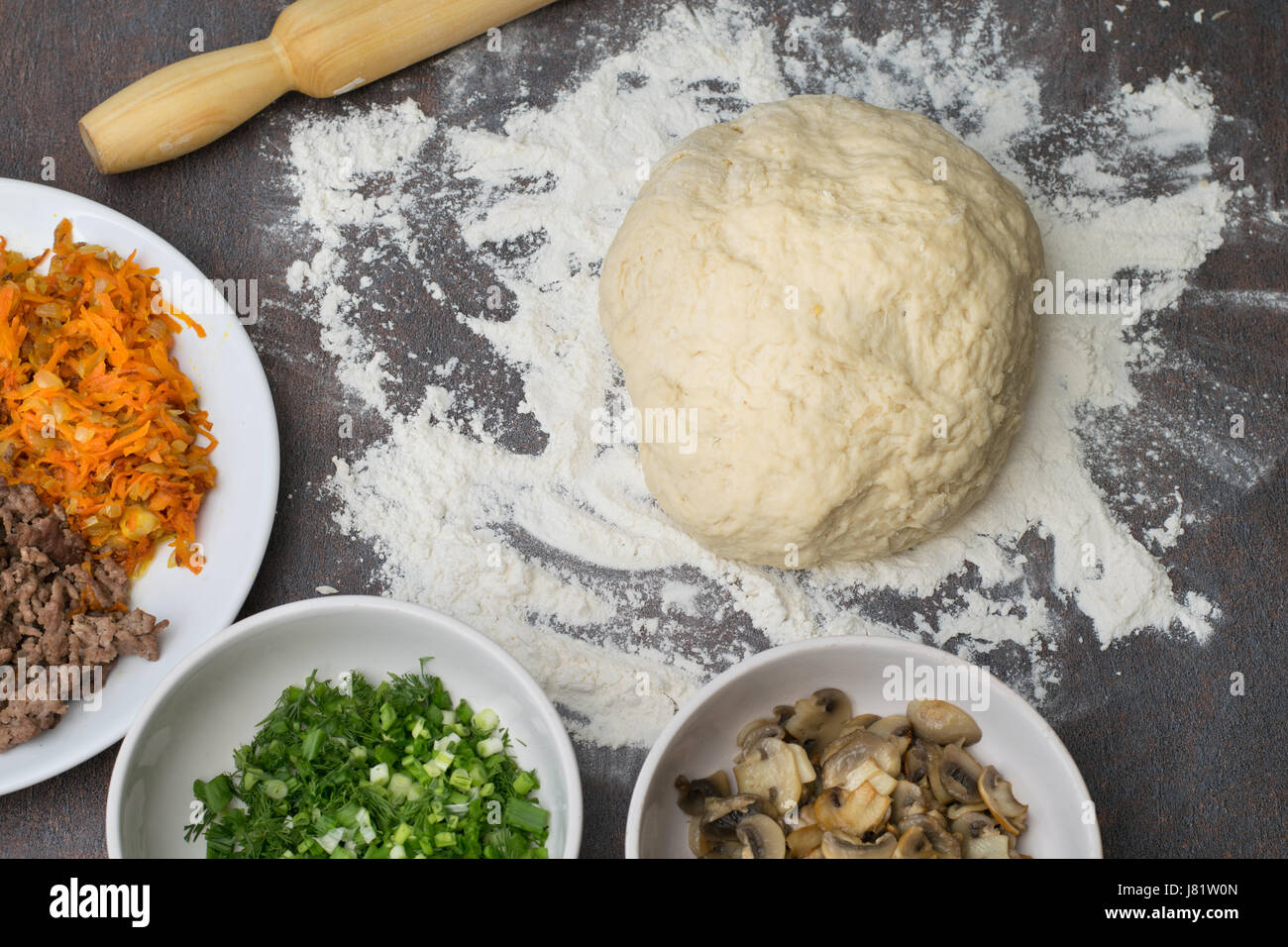 preparing buns with filling Stock Photo - Alamy