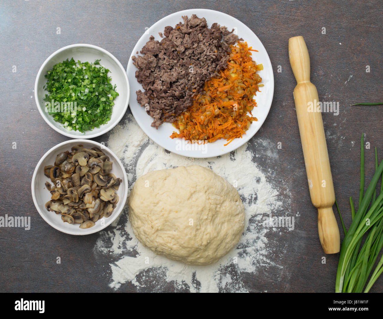preparing buns with filling Stock Photo - Alamy