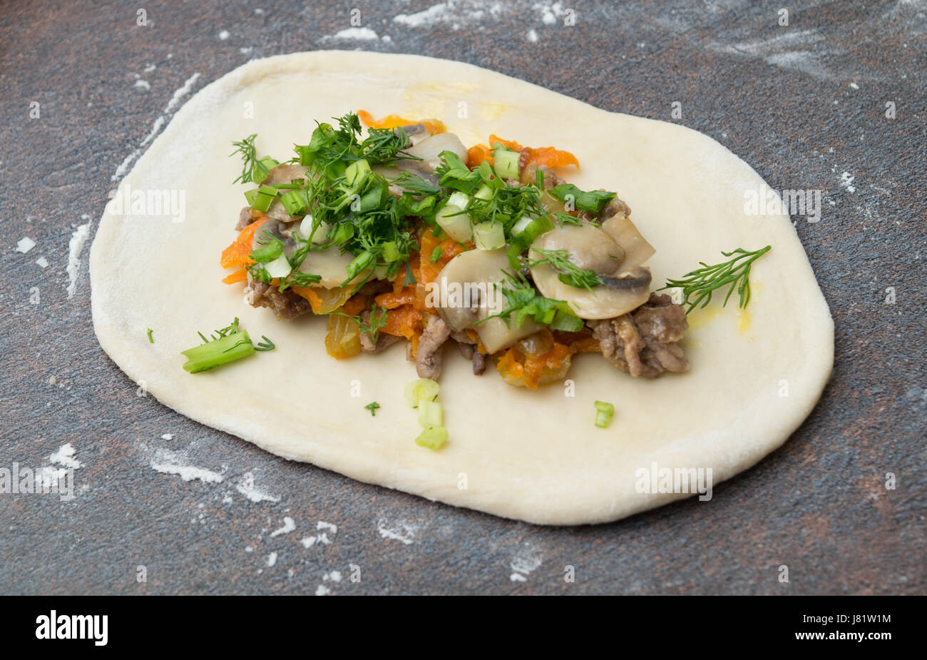 preparing buns with filling Stock Photo - Alamy