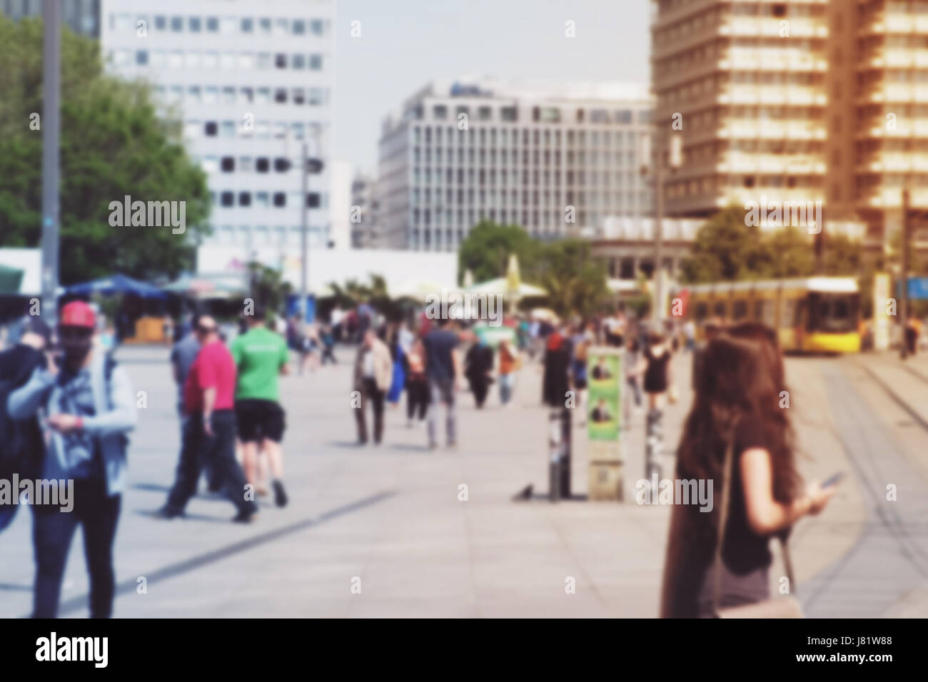crowds of people in motion blur crossing a city street Stock Photo - Alamy