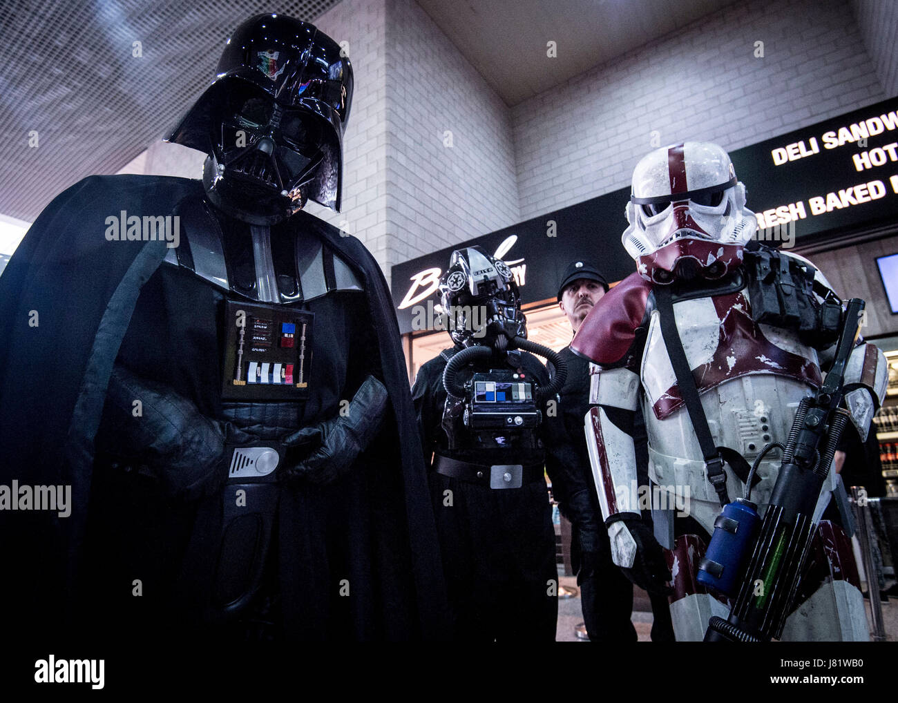EDITORIAL USE ONLY People dressed as Darth Vader and Stormtroopers ...