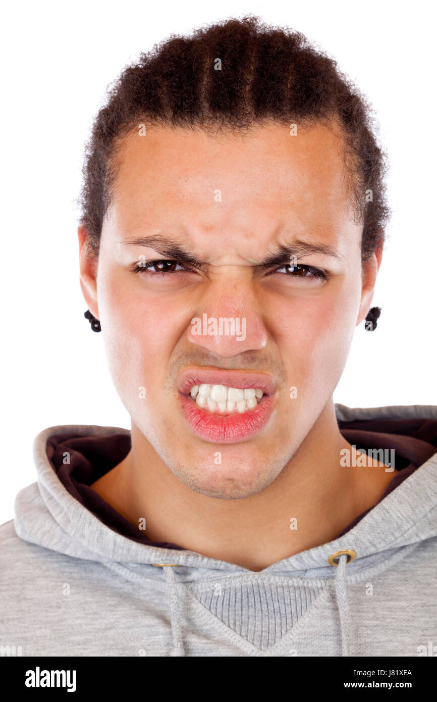 portrait of a dark-skinned angry young Stock Photo - Alamy