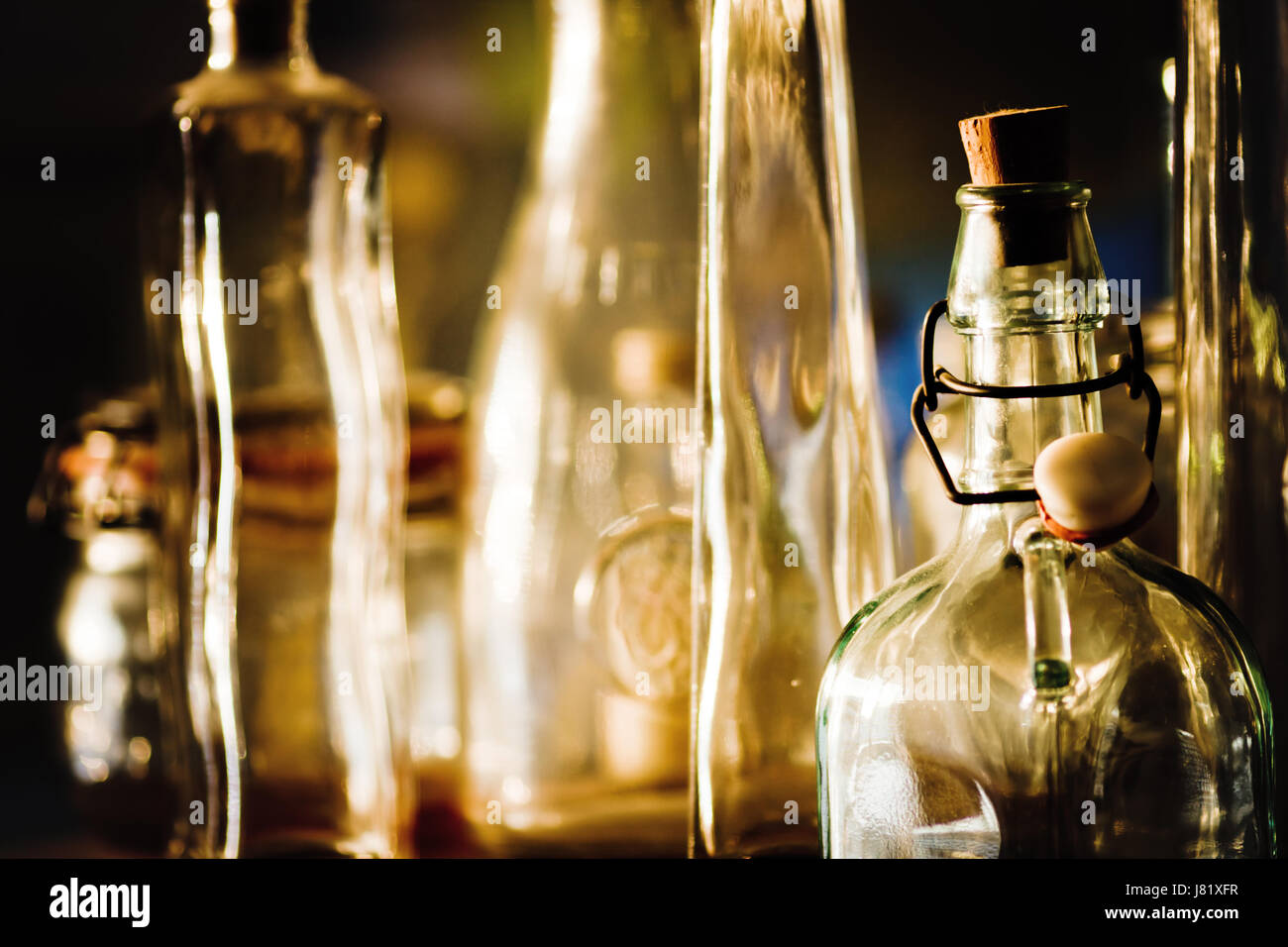glowing glass bottles Stock Photo - Alamy