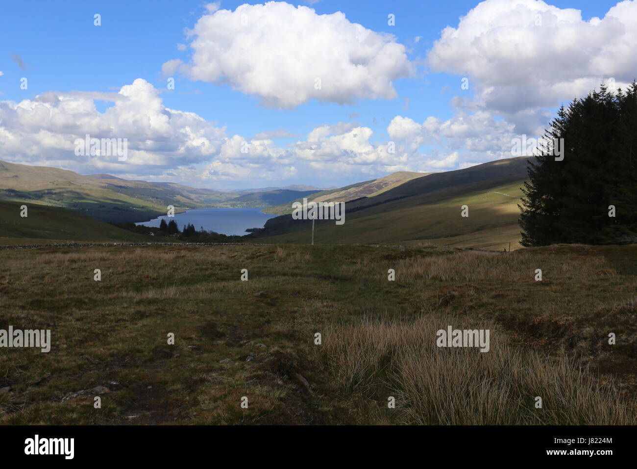 Marker post on Rob Roy Way with distant Loch Tay Scotland May 2017 ...