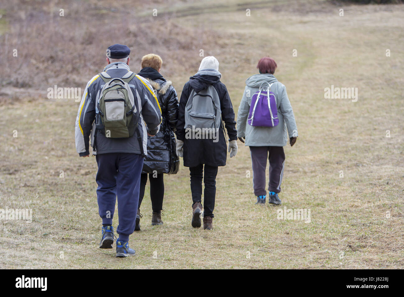 Group of hikers in a walk in nature Stock Photo - Alamy