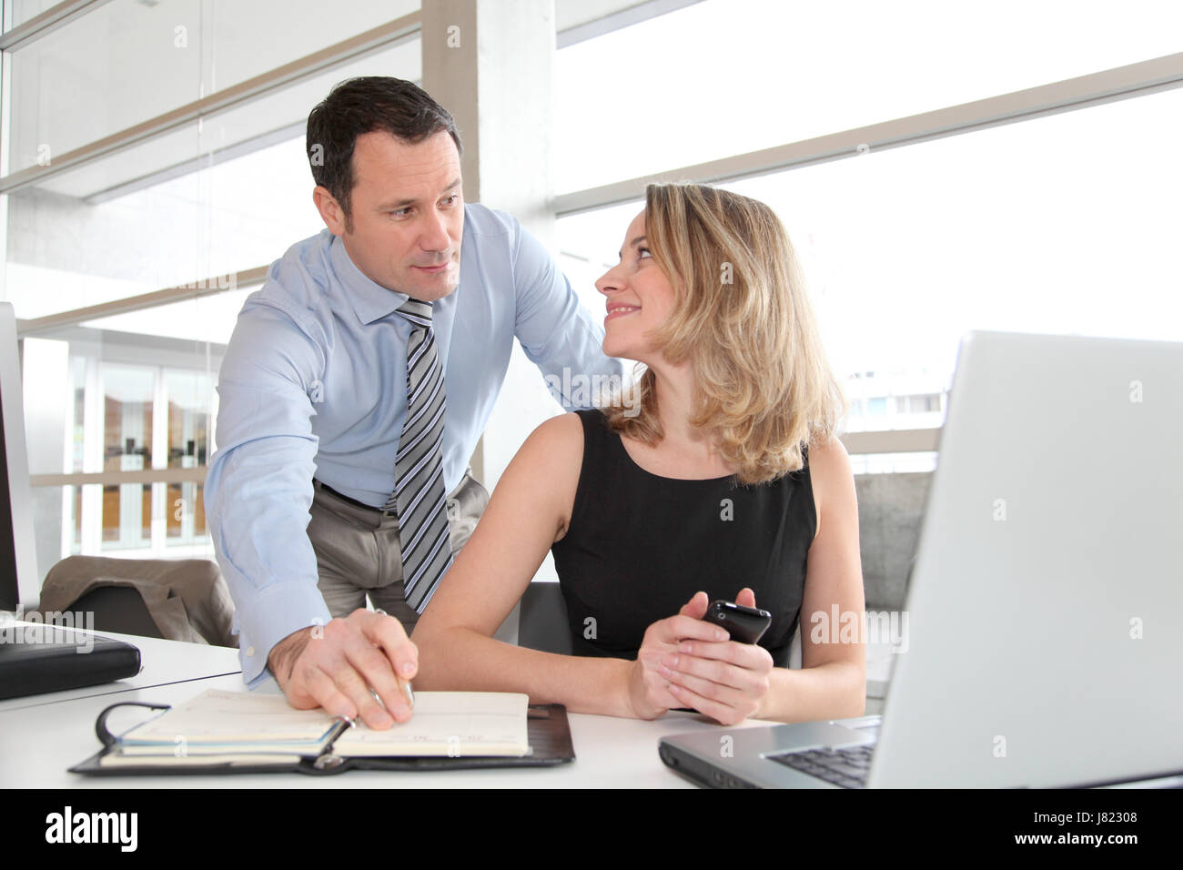 woman office laptop notebook computers computer write wrote writing ...