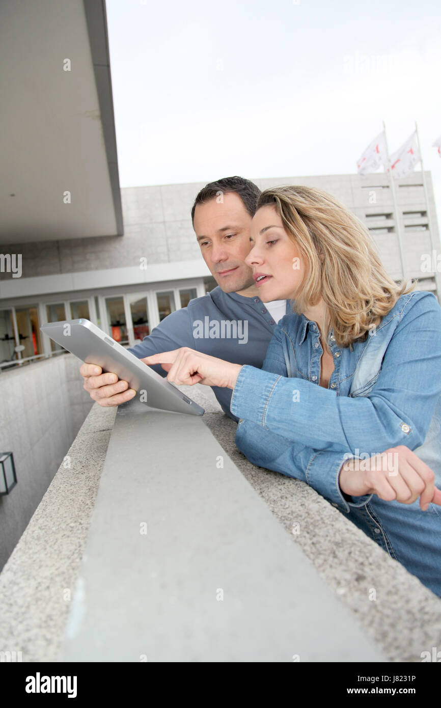 woman city town closeup electronics portrait outside pda email ...