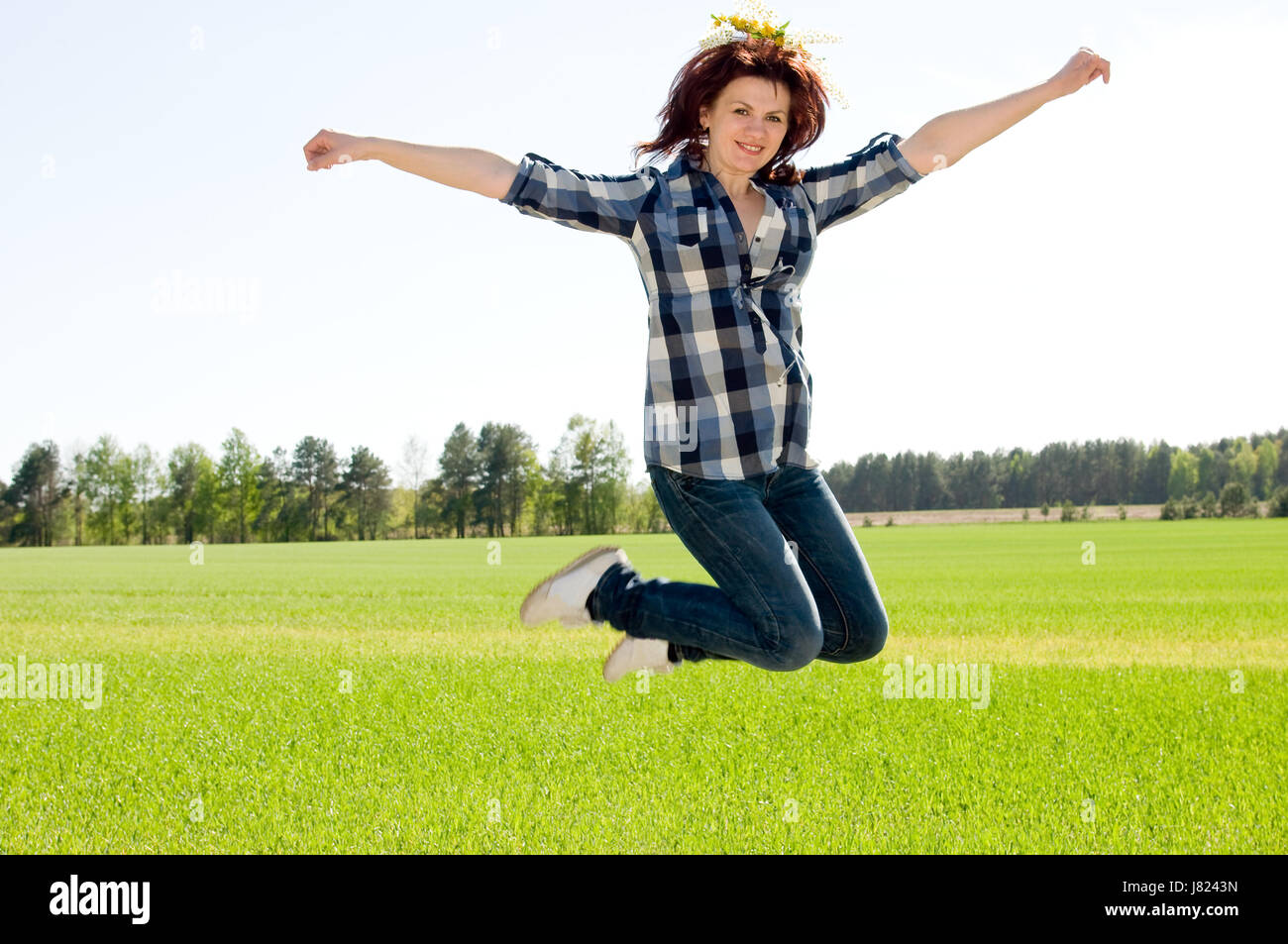 woman field freedom liberty spring bouncing bounces hop skipping frisks ...