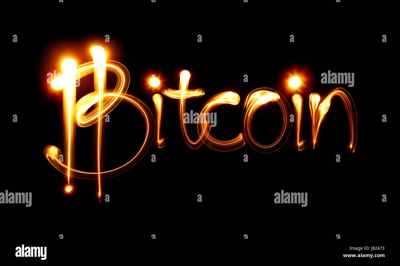 Bitcoin sign and word over black background. Light painting Stock Photo ...