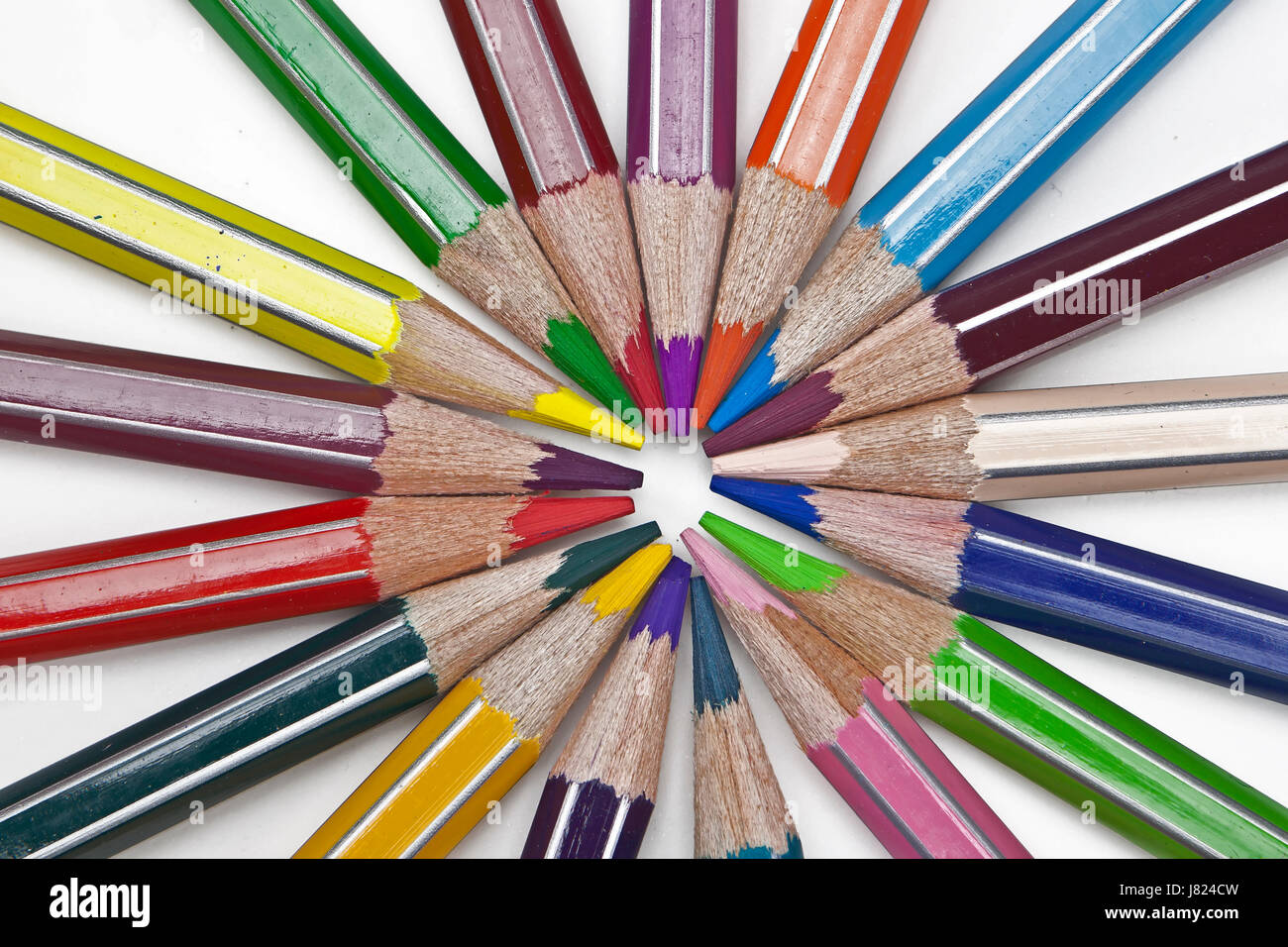 blue coloured pointed colour sharpened colors colours crayon yellow pen ...