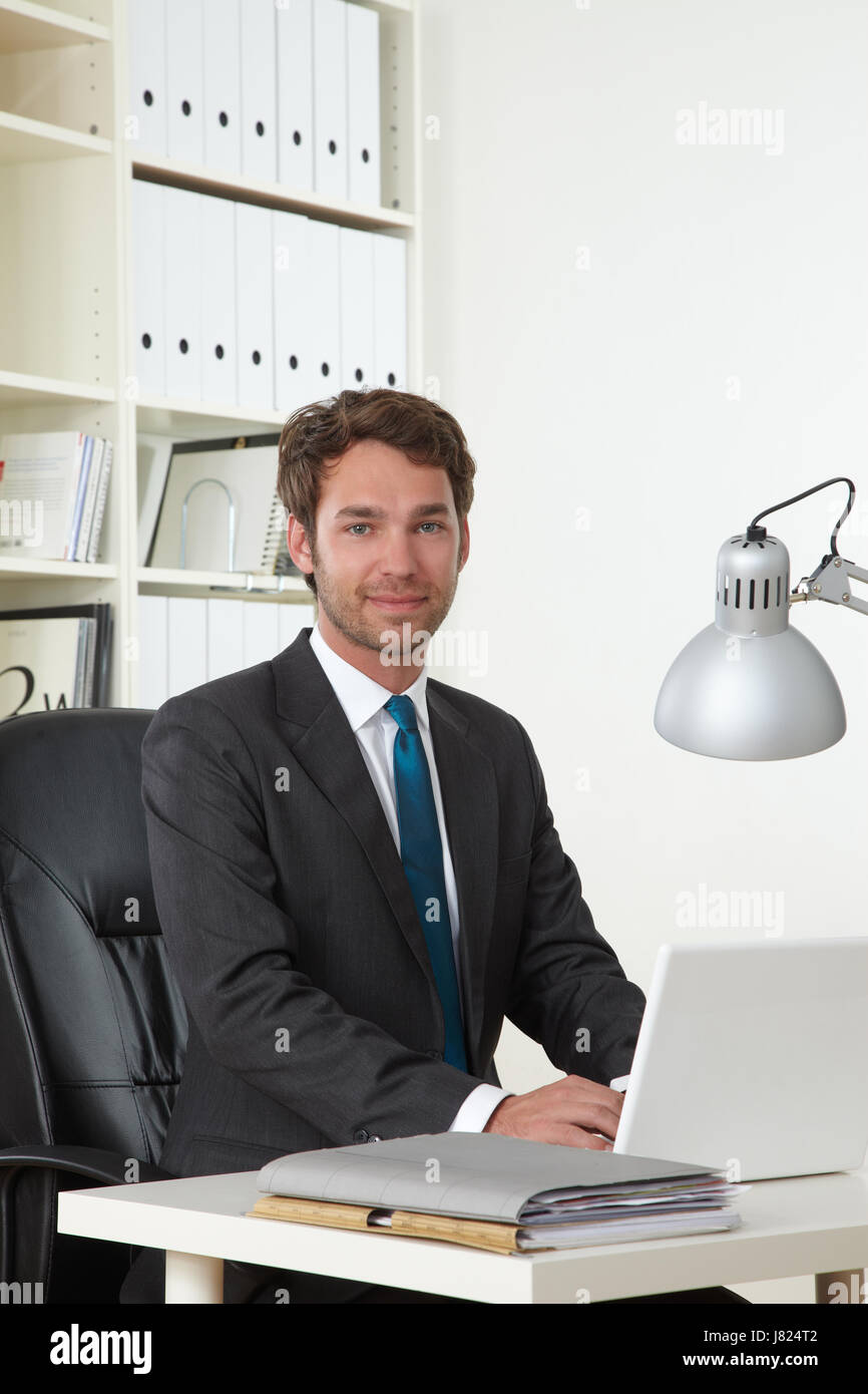 office laptop notebook computers computer desk sits business man ...