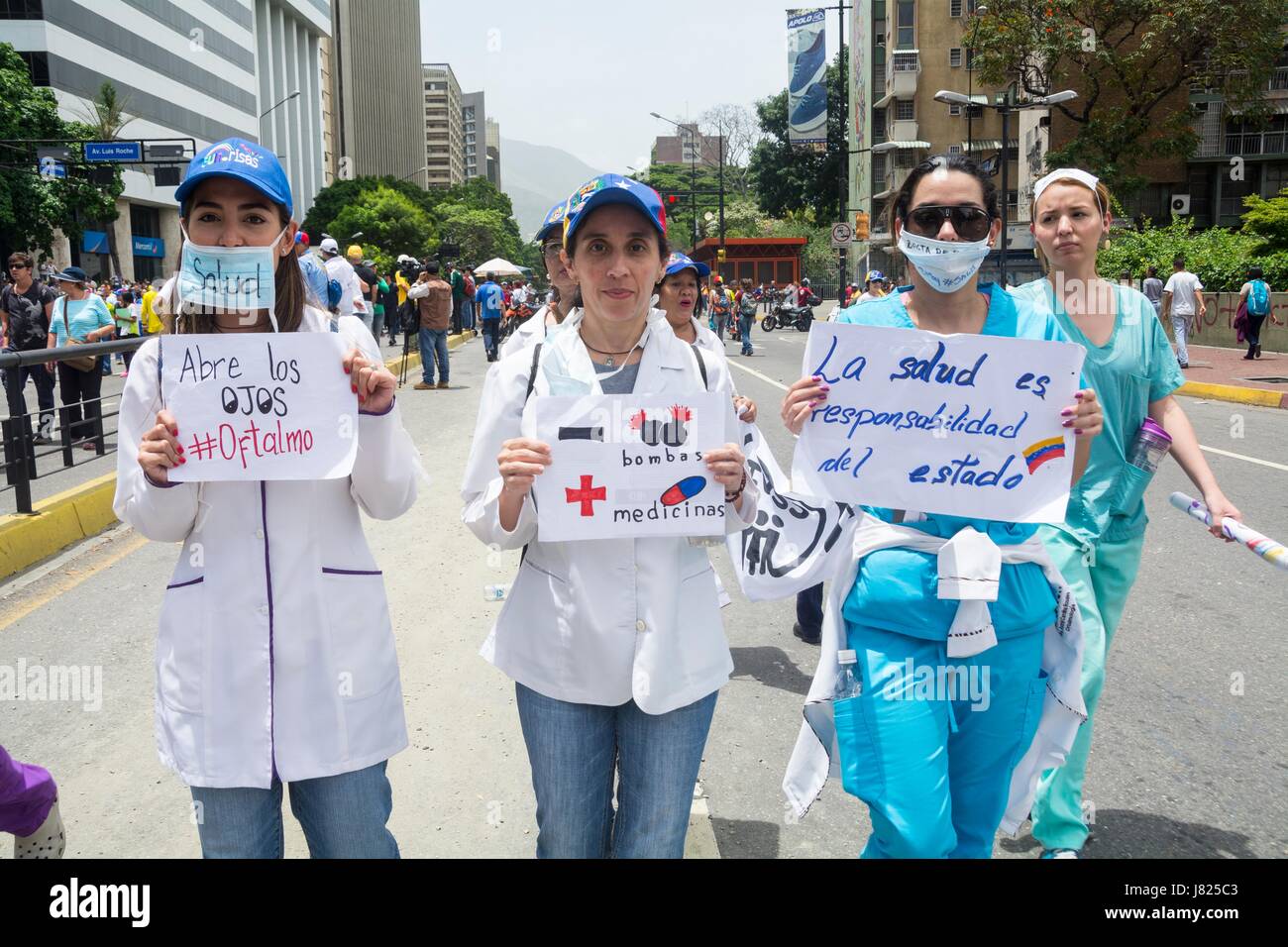 Doctors, health personnel and nurses march on drug applications and a ...