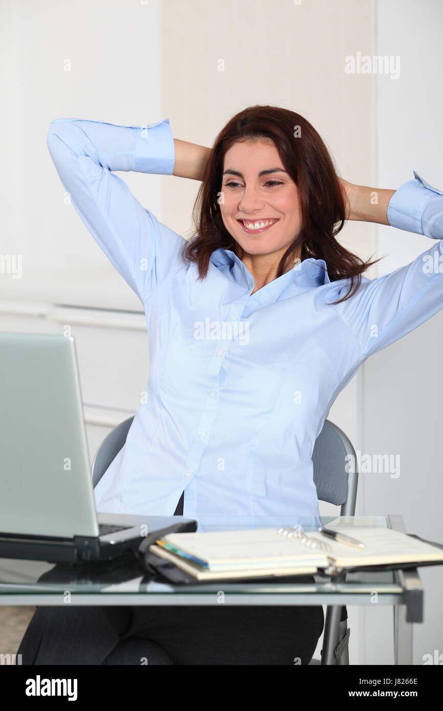 woman office laptop notebook computers computer laugh laughs laughing ...