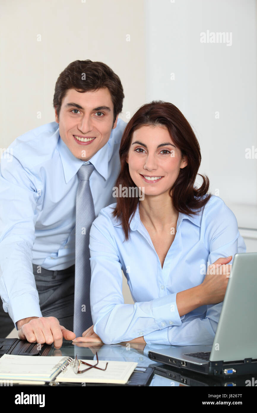 woman office laptop notebook computers computer laugh laughs laughing ...
