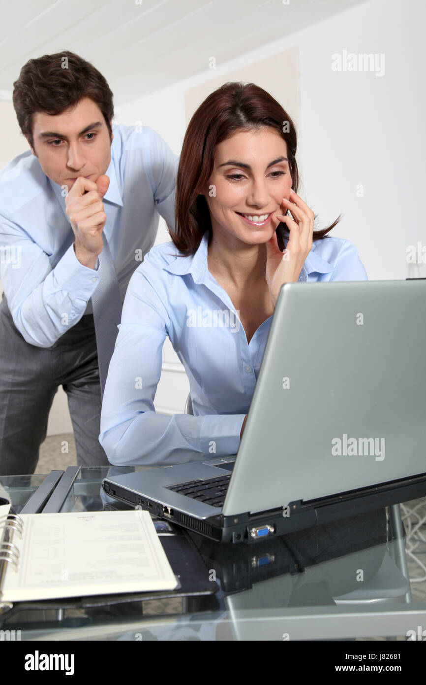 woman office laptop notebook computers computer laugh laughs laughing ...