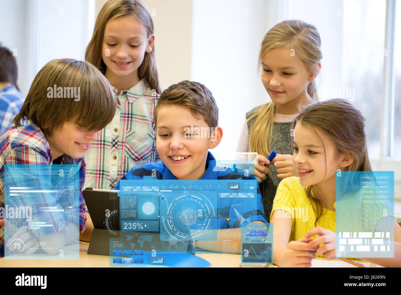 group of school kids with tablet pc in classroom Stock Photo - Alamy