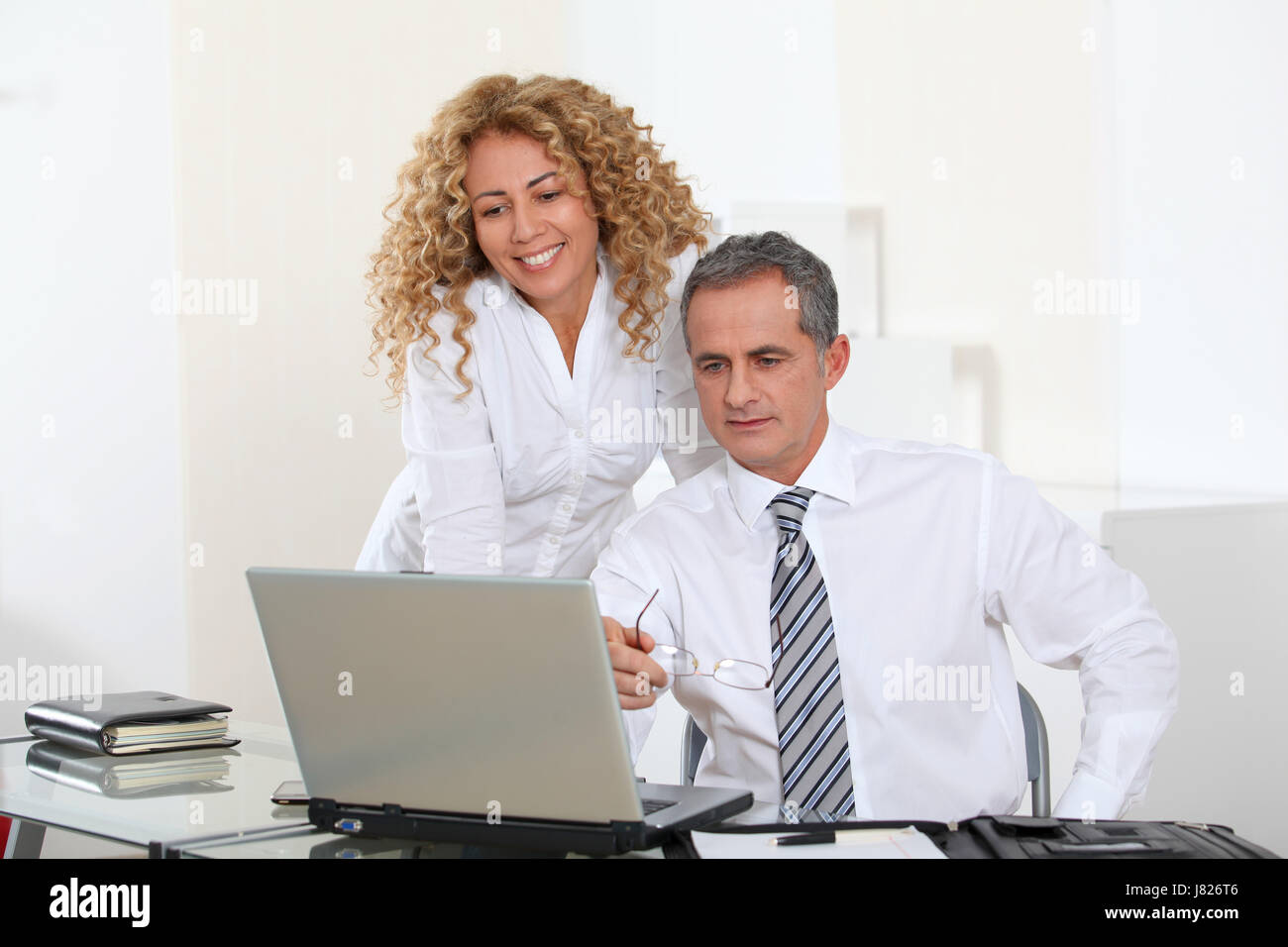 woman office laptop notebook computers computer laugh laughs laughing ...