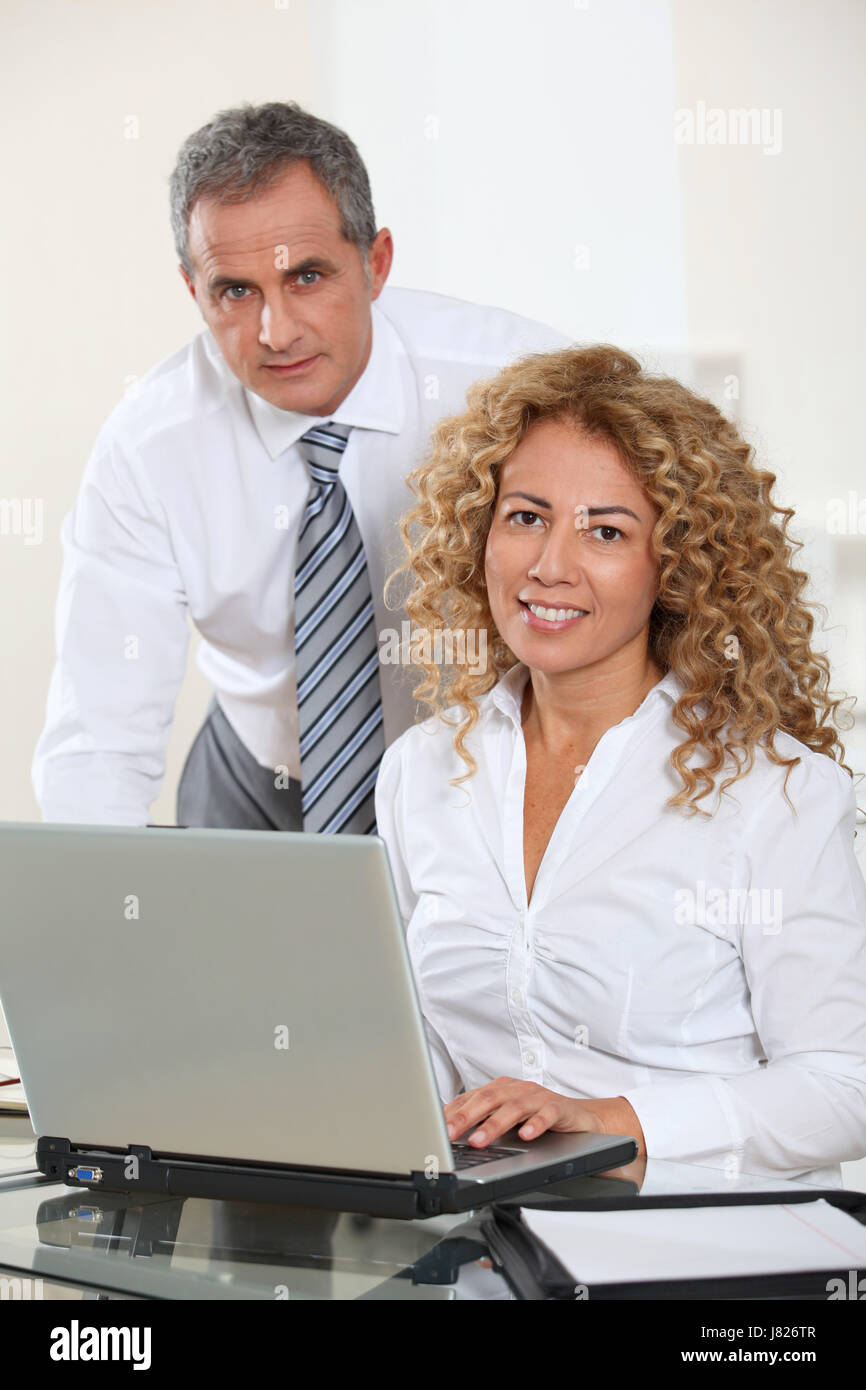 woman office laptop notebook computers computer laugh laughs laughing ...