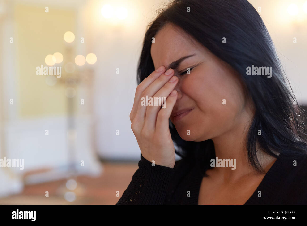 unhappy crying woman at funeral in church Stock Photo - Alamy