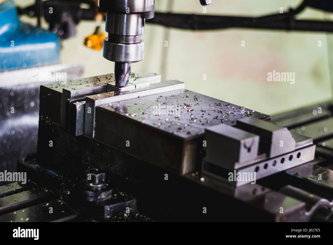 active milling machine during processing part of engine industry ...