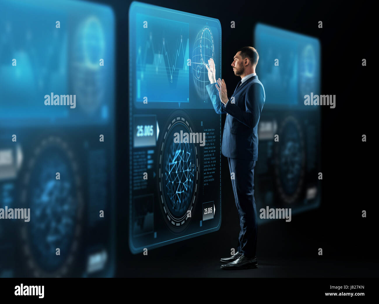 businessman with virtual screens projection Stock Photo - Alamy