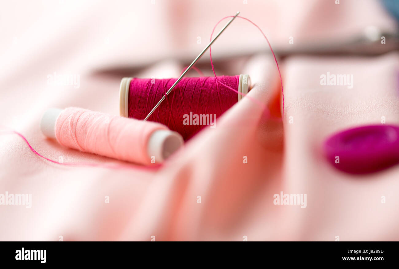 Needle and cloth hi-res stock photography and images - Alamy