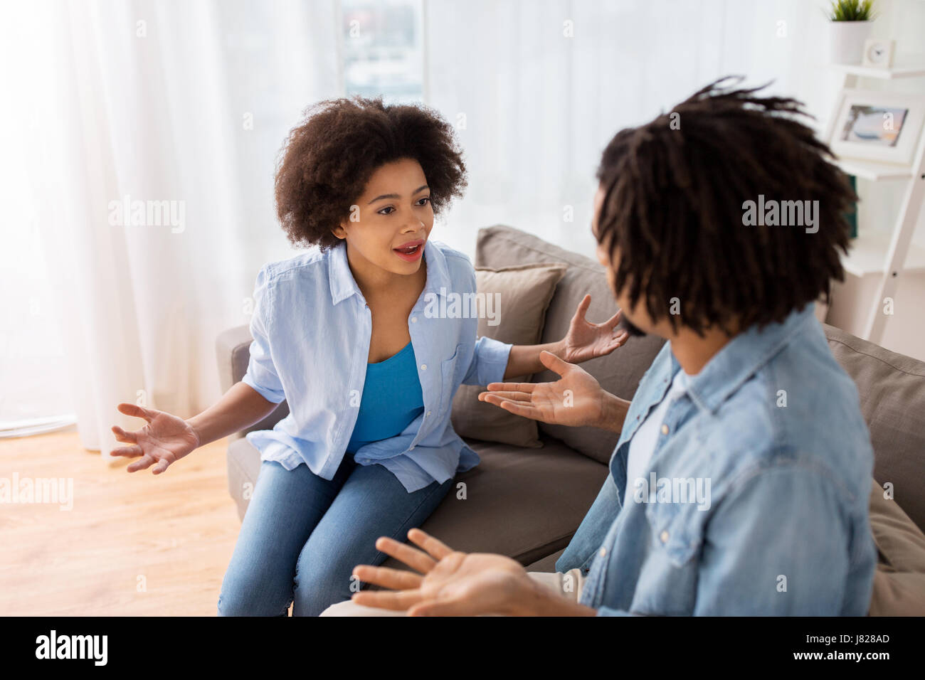 unhappy couple having argument at home Stock Photo - Alamy