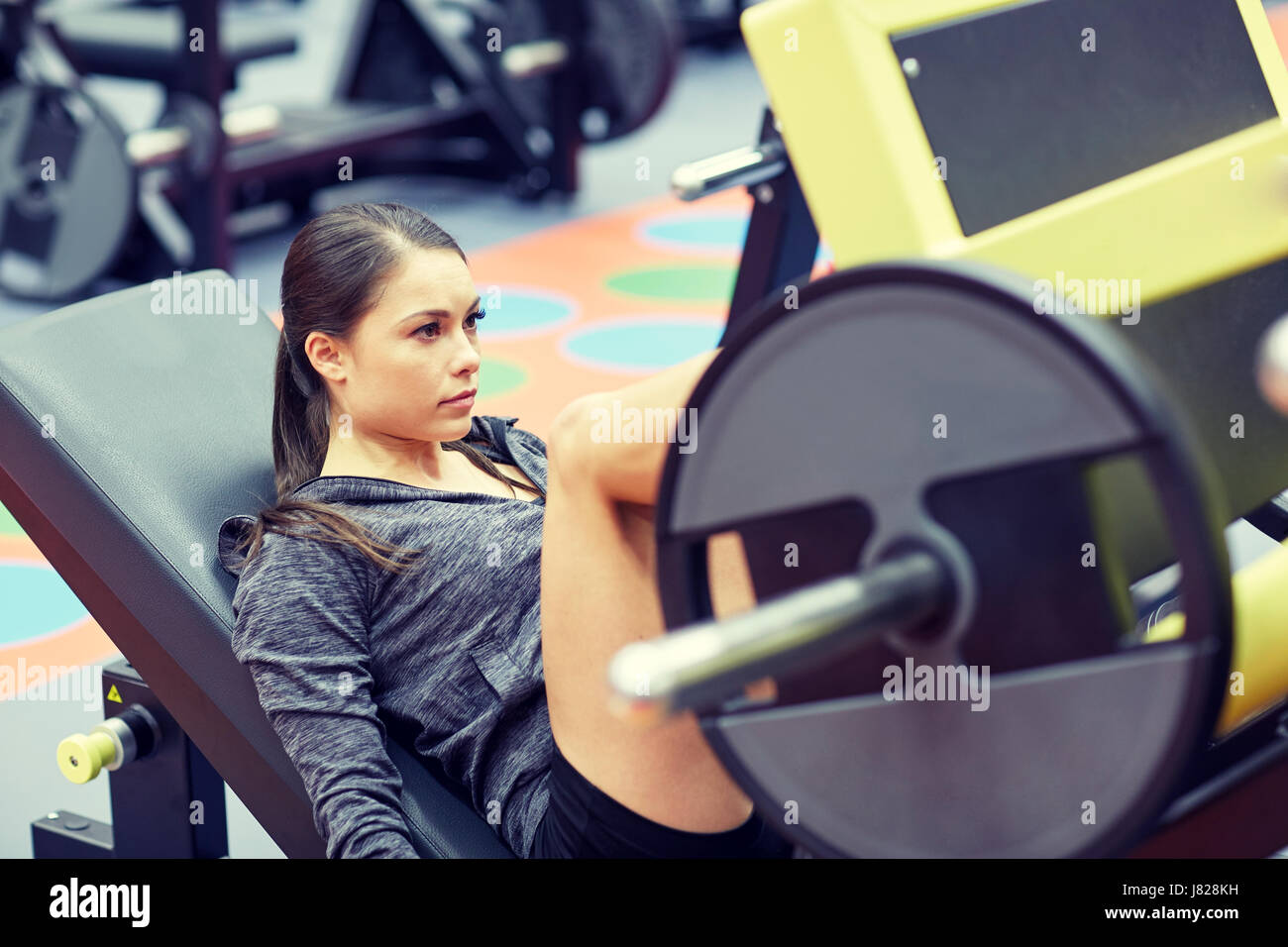 Woman flexing muscles on leg hi-res stock photography and images - Alamy