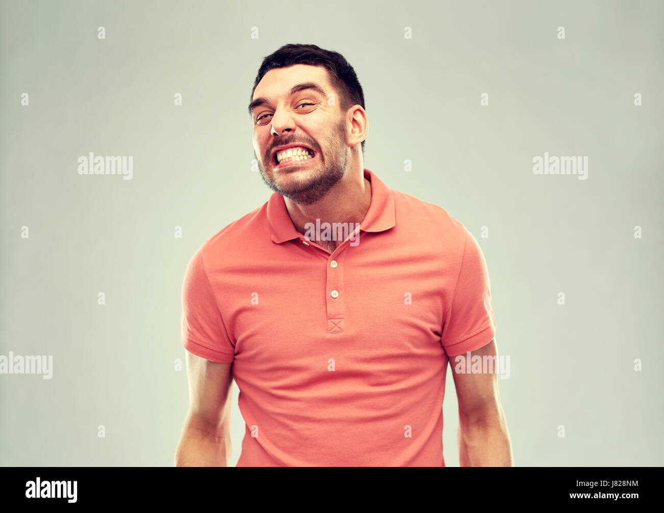 Angry guy making face hi-res stock photography and images - Alamy