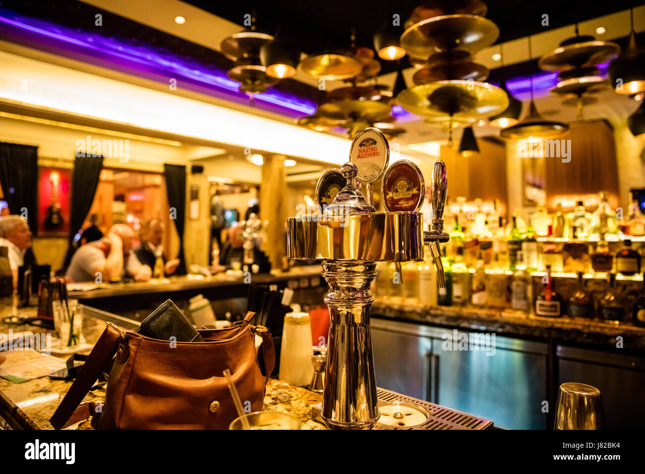 Florence, Italy - 11 November 2015: Classic bar counter with bottles in ...